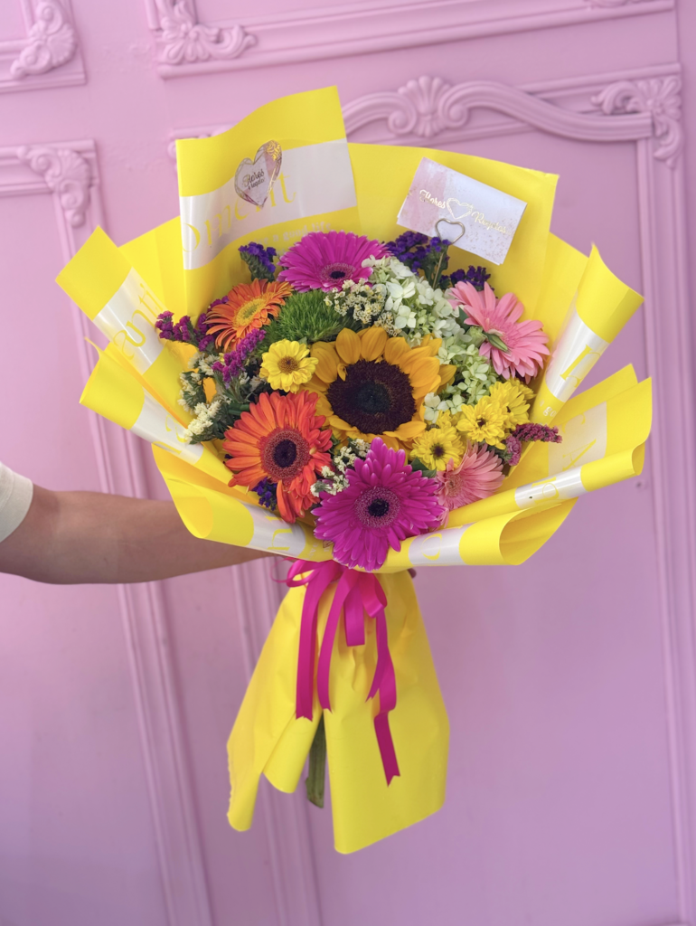 Ramo de 12 Flores de Colores - Flores & Regalos